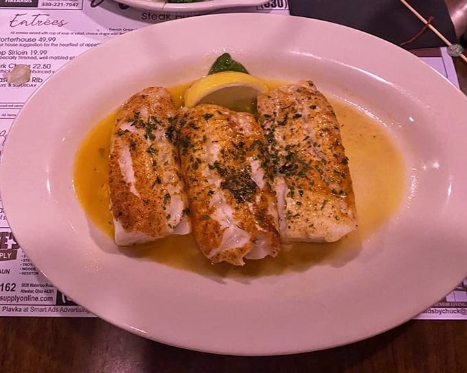Perfectly broiled cod swimming in butter and herbs. For those rare moments when you visit a legendary steakhouse but somehow don't order steak.