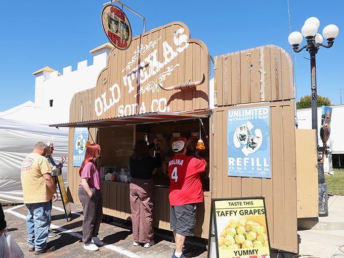 Old Texas Soda Co. draws festival-goers with the promise of unlimited refills and "taffy grapes" – whatever those are, they must be yummy! 