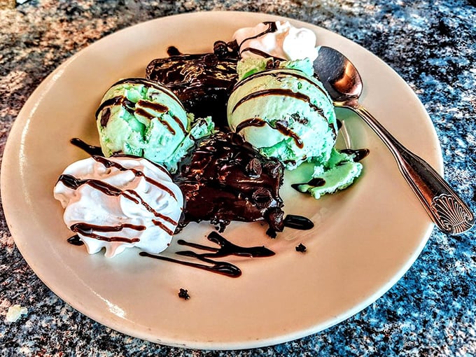 A brownie sundae that doesn't just satisfy your sweet tooth—it throws a party for it, complete with mint ice cream VIPs.