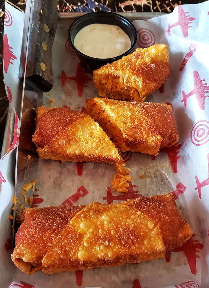 Buffalo chicken eggrolls—the culinary equivalent of a perfect first date. Familiar enough to trust, but exciting enough to remember.