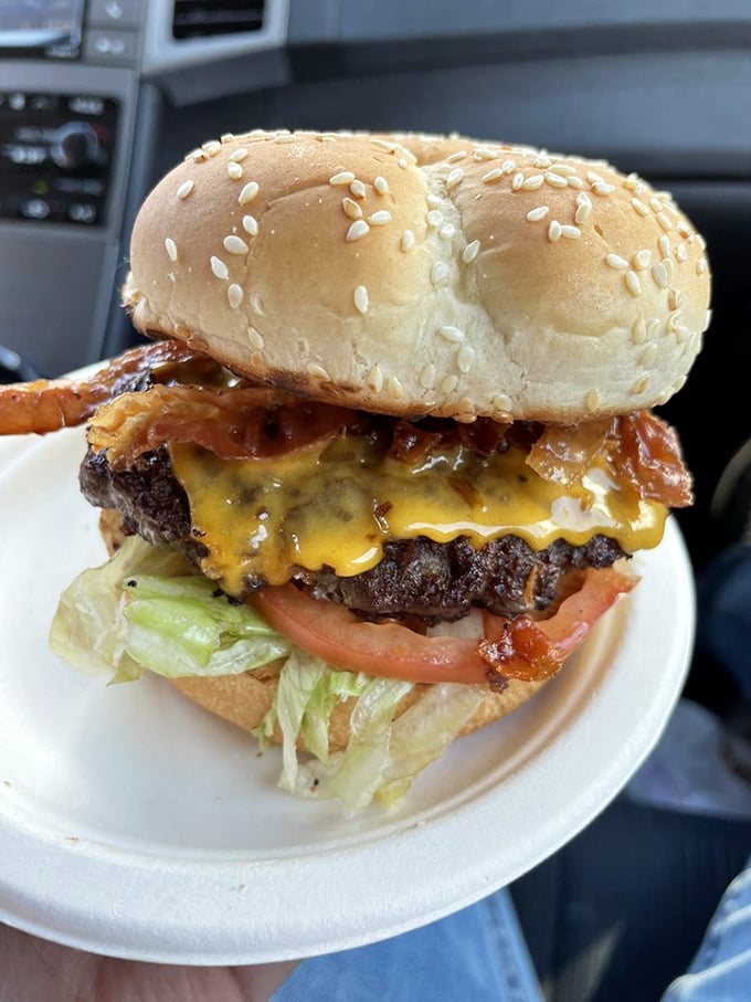 Behold the Bunny Burger in all its glory—where bacon, cheese, and beef create a trifecta of flavor that makes vegetarians question their life choices.