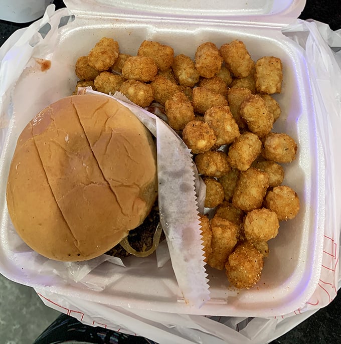 A burger and tots combo that makes you wonder why you ever wasted time on lesser lunches. Simple perfection in a foam container.
