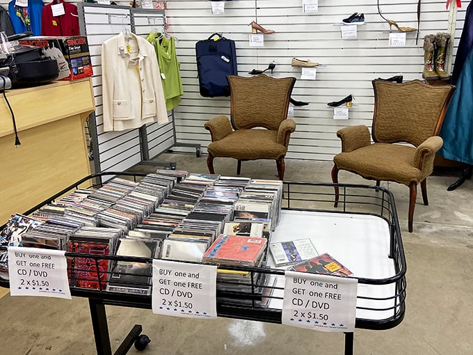The CD collection and those elegant chairs create the perfect vignette for time travelers from 1998. Buy one, get one free—just like memories.