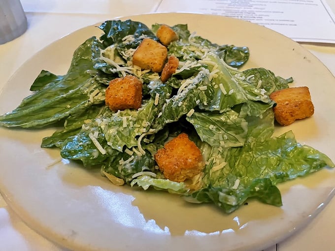 A Caesar salad that Julius himself would approve—crisp romaine, golden croutons, and a dressing that deserves its own fan club.