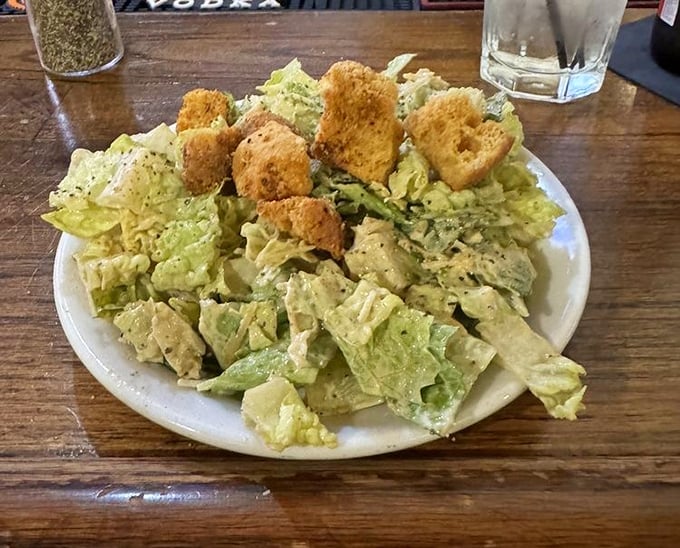 A Caesar salad that Julius himself would approve of—simple, classic, and the perfect prelude to the main event.