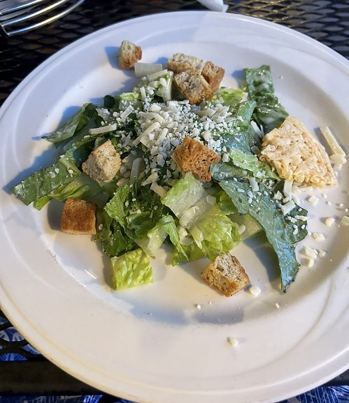 A Caesar salad that respects the classics—crisp romaine, proper croutons, and just enough dressing to make each bite sing without drowning the chorus.