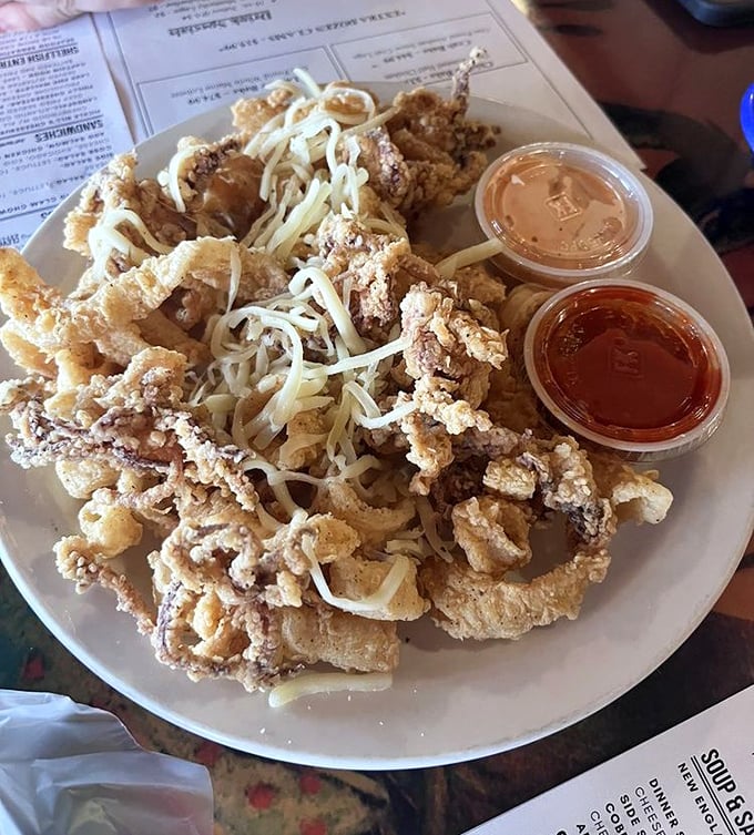 Calamari that's been given the royal treatment—crispy, tender, and ready for dunking. These rings deserve Olympic medals for perfect form.