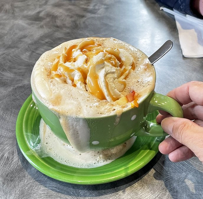That caramel-topped latte isn't just a beverage—it's morning motivation in a polka-dotted mug. Coffee art that deserves gallery space.