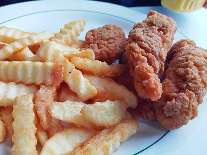Chicken fingers and crinkle-cut fries – proof that sometimes the simplest pleasures are the most satisfying. Crispy, comforting, and absolutely no utensils required.