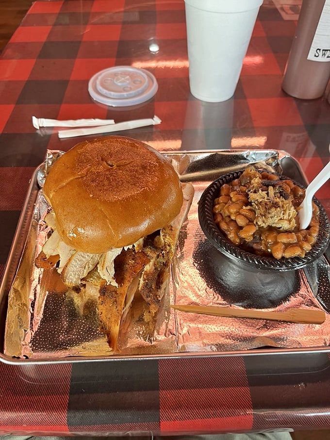 A sandwich that requires both hands and several napkins—the true measure of barbecue excellence in the South.