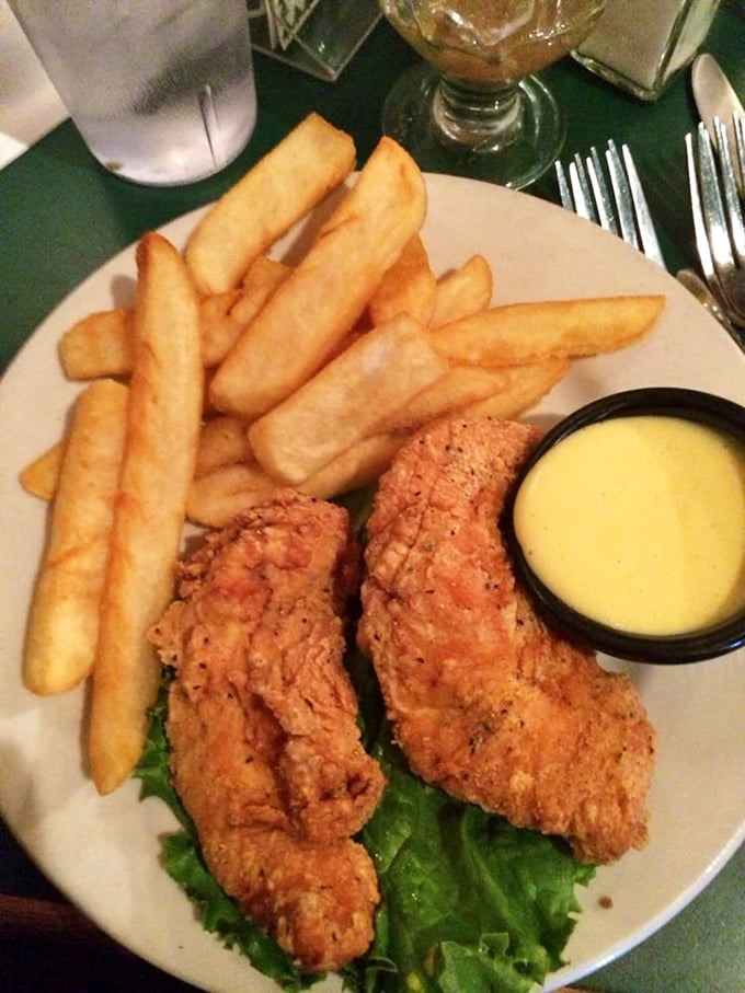 Golden-fried chicken tenders and fries—because sometimes even seafood lovers need a delicious detour into comfort food territory.