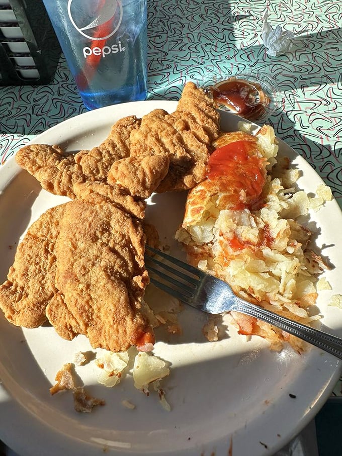 Crispy chicken tenders that could make a vegetarian question their life choices. Paired with hash browns that have achieved that mythical crispy-yet-tender perfection.