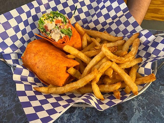 Fresh ingredients wrapped in a warm tortilla with crispy fries on the side—proof that even Mayberry knows how to do casual modern classics right.