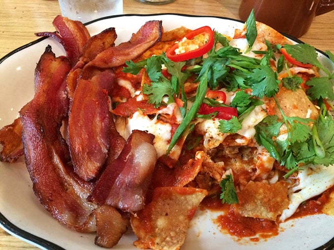 Chilaquiles and bacon – the breakfast power couple that proves some relationships are worth the calories, especially when cilantro plays matchmaker.