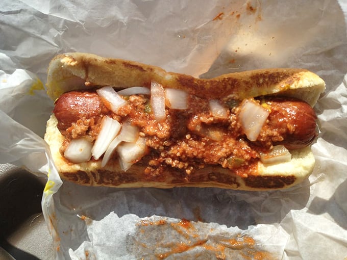 This isn't just a chili dog—it's a masterpiece of contrasting textures and flavors that somehow manages to be both nostalgic and exciting.