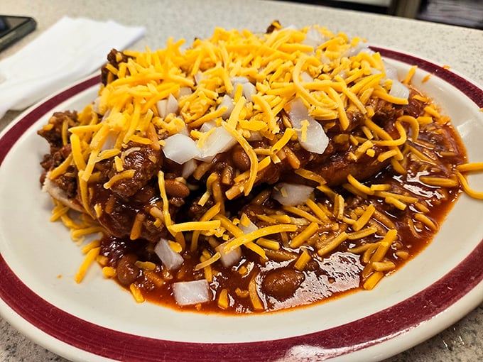Cincinnati might claim chili fame, but this Hoosier version – smothered in shredded cheese and diced onions – makes a compelling argument for Indiana's chili credentials.