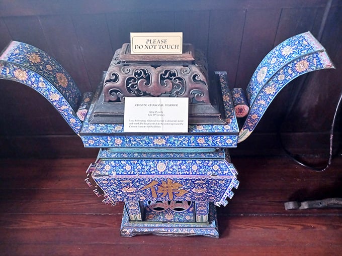 "Please do not touch" is museum-speak for "this Chinese charcoal warmer has survived centuries and doesn't need your fingerprints as souvenirs."