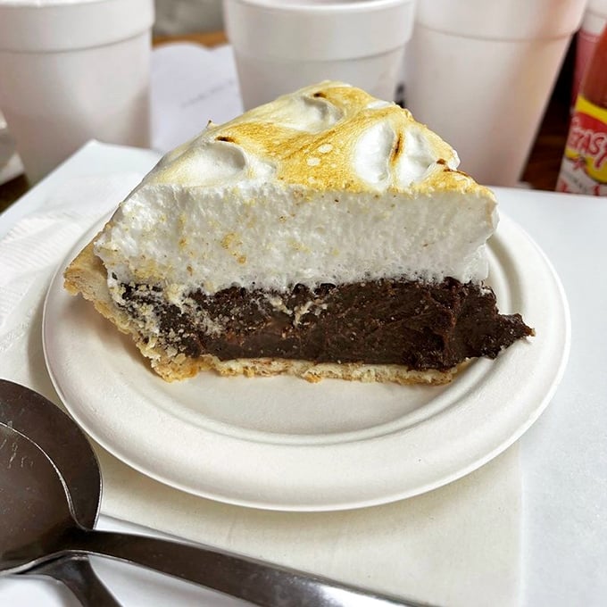 Chocolate pie with mile-high meringue—because after conquering mountains of barbecue, you deserve a cloud-like dessert to float away on.