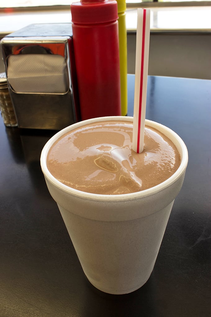 A chocolate shake so thick the straw stands at attention—the perfect cool counterpoint to Hunter House's hot-off-the-grill offerings.