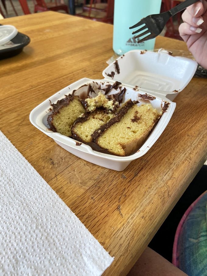 After the smoke clears, there's chocolate cake—simple, honest, and exactly what your grandmother would make if she were a barbecue legend.