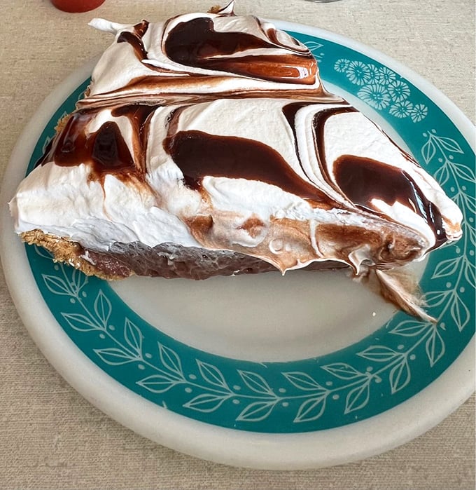 The chocolate cream pie doesn't just satisfy your sweet tooth—it throws a full-blown celebration for it, complete with swirls of meringue confetti.