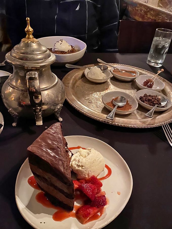 Chocolate cake that doesn't just satisfy your sweet tooth—it throws a party for it, complete with strawberries and ice cream as welcome guests.