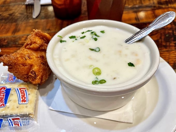 Clam chowder so creamy it should come with its own warning label. That sprinkle of green onions isn't just garnish—it's the perfect finishing touch.