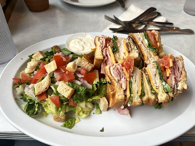 The club sandwich: architectural marvel of the culinary world. Three stories of deliciousness that makes skyscrapers jealous.