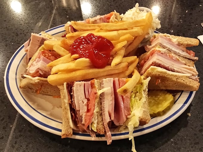 The club sandwich – architectural marvel of the diner world. Three stories of deliciousness that requires both hands and possibly a strategy meeting.