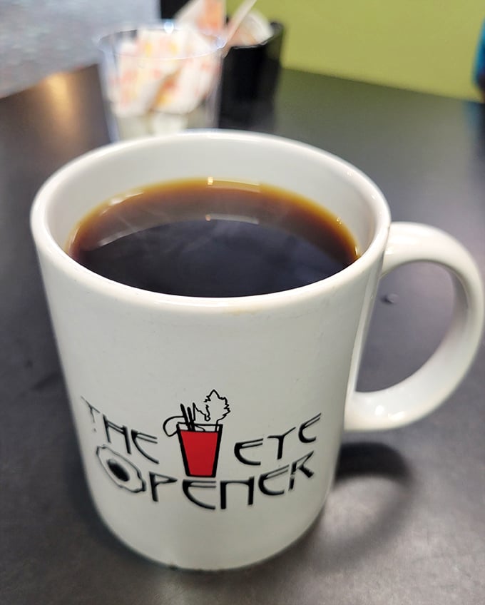 The coffee comes in mugs emblazoned with the restaurant's logo—because ordinary cups simply won't do for this extraordinary brew.