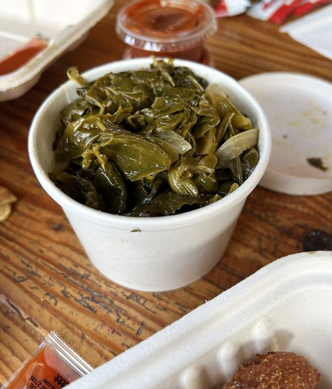 These collard greens have been cooked with respect—tender but still maintaining their integrity, the perfect counterpoint to fried seafood.