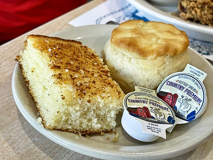 Cornbread and biscuit: the Southern dynamic duo. One crumbly, one fluffy, both destined to disappear before the main course arrives.