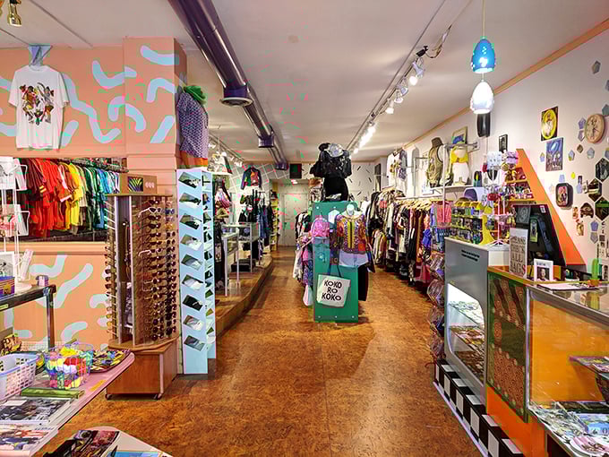 The shop unfolds like a well-organized fever dream, where '90s sportswear meets '80s prom dresses under the watchful gaze of vintage wall art.