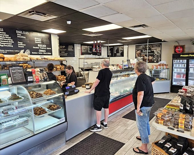 The bakery counter—where willpower goes to die and diet resolutions are forgotten amid the siren call of fresh-baked treasures.