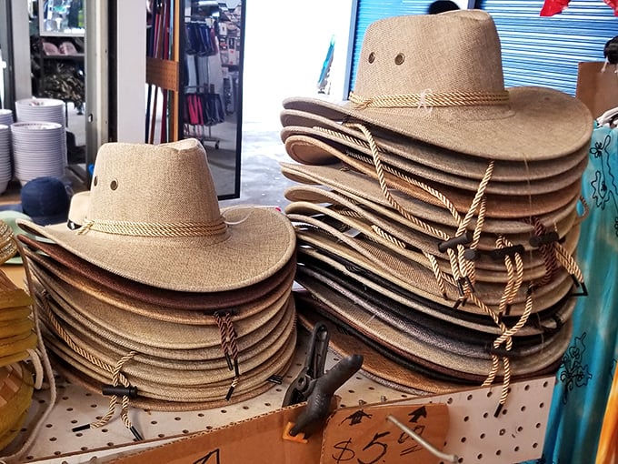 Cowboy hat central—where $5 transforms city slickers into ranch hands, at least in their imagination.