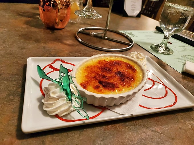 Crème brûlée with the perfect glass-like sugar top that makes that satisfying "crack" when your spoon breaks through. Dessert architecture at its finest.