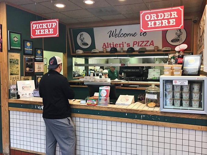 The ordering counter—where anticipation begins and patience is tested. Worth every second of the wait.