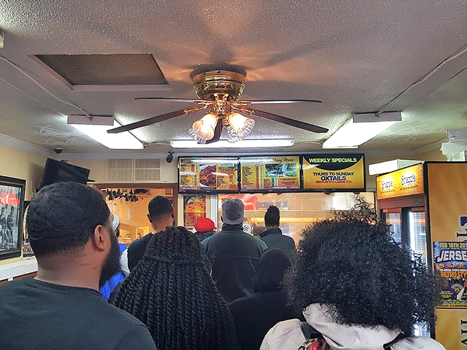 The line of customers speaks volumes—when locals are willing to wait, you know you've found the real deal. Food worth standing for!