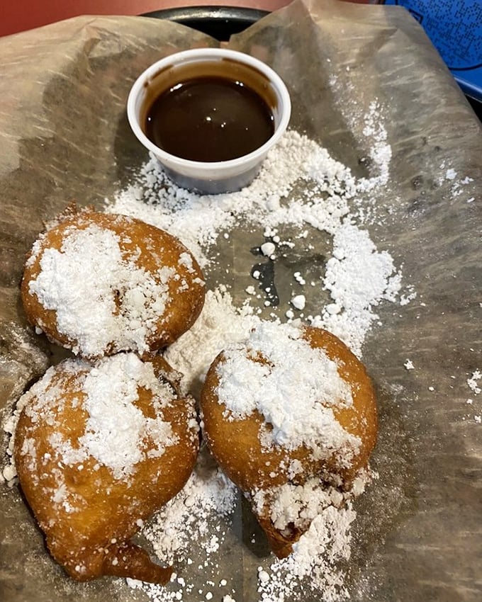 Deep-fried Oreos dusted with powdered sugar—because sometimes dessert needs to dress up for the occasion. Dipping sauce included for overachievers.