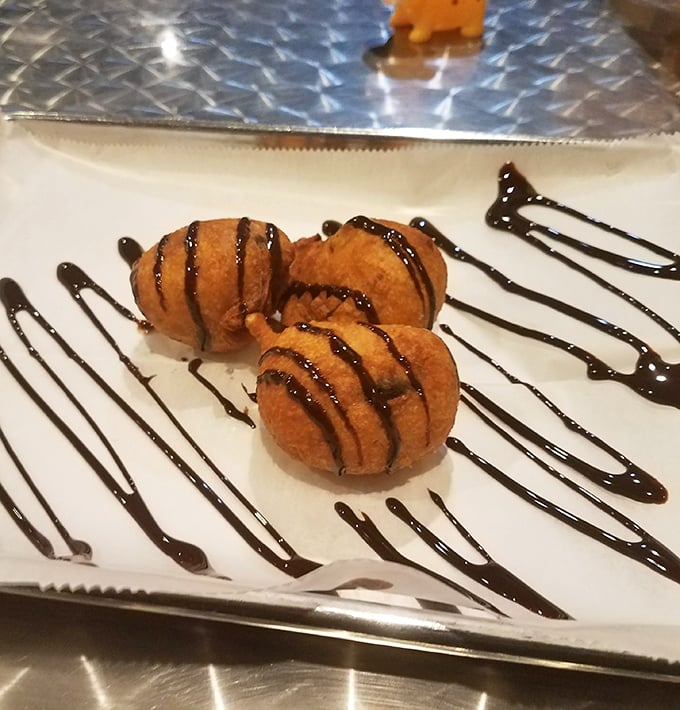 Deep-fried Oreos drizzled with chocolate – because after conquering mountains of meat, you deserve a dessert that's equally indulgent and slightly ridiculous.