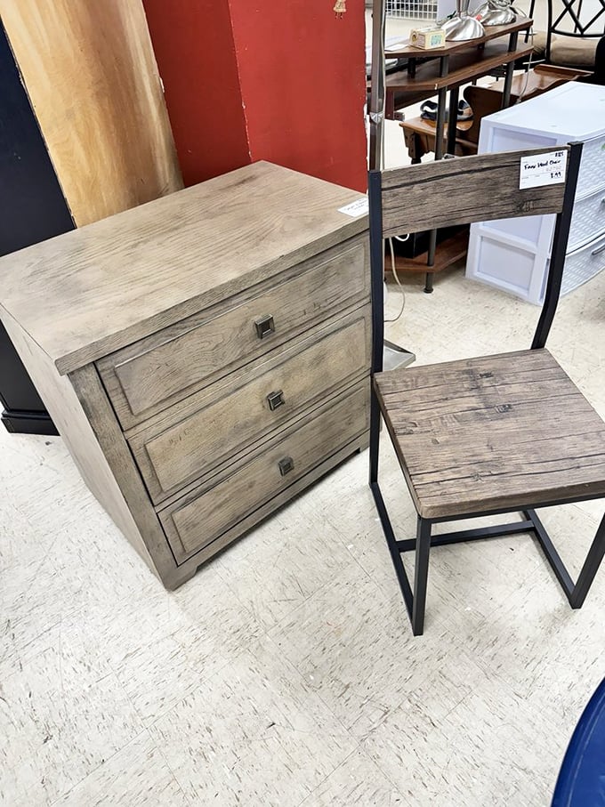 Modern meets rustic in this weathered wood dresser and chair combo—perfect for that "I decorated intentionally" farmhouse vibe.