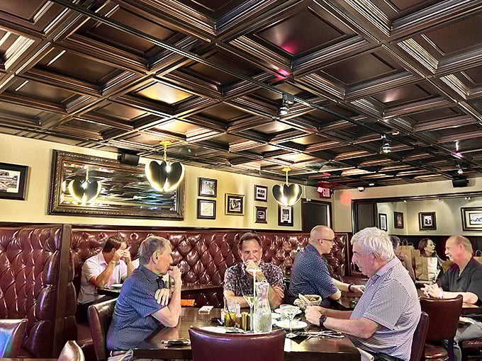 The dining room hums with the universal language of satisfaction—the gentle murmur of conversations punctuated by occasional sighs of steak-induced bliss.