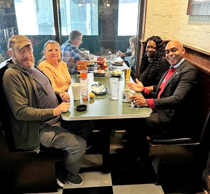 Strangers at separate tables, united by the universal language of good food. Every great diner has regulars who become part of its story.