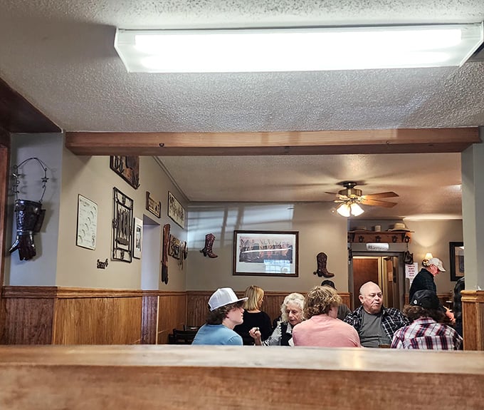 Where strangers become neighbors over plates of home cooking. Notice nobody's looking at their phones—the food commands full attention here.