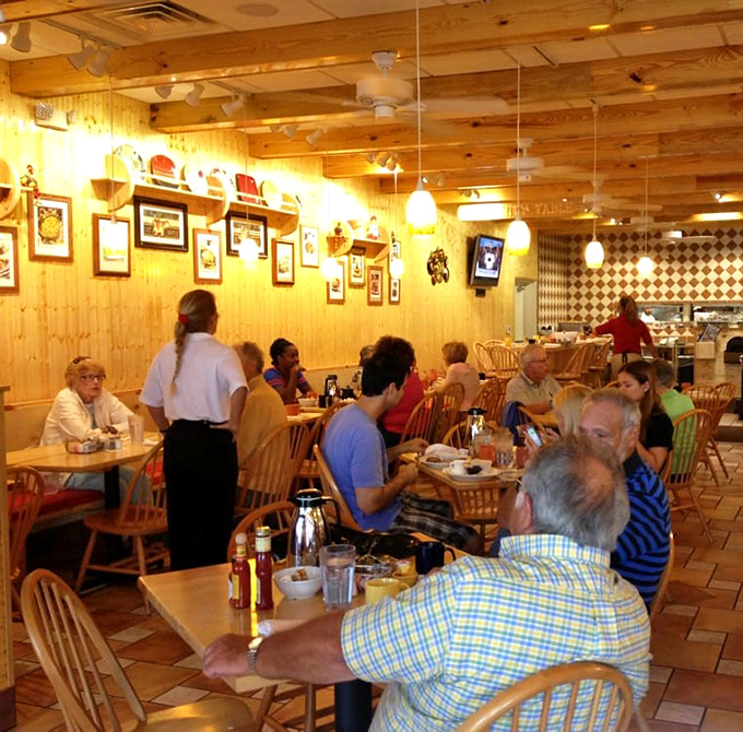 The dining room hums with the satisfied murmurs of breakfast enthusiasts. Notice nobody's looking at their phones – the food demands full attention.