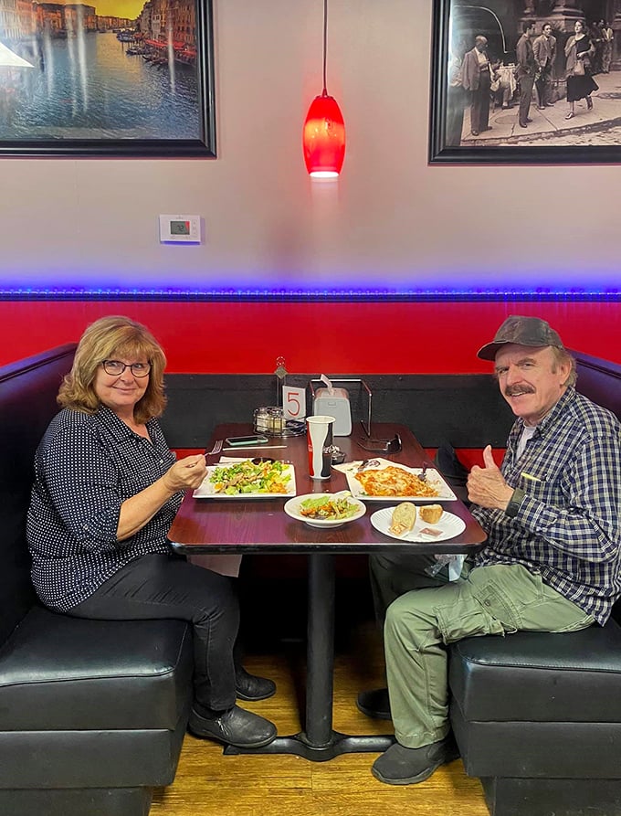 Happy diners enjoying the fruits of Tony's kitchen labor—that thumbs-up says more than any Yelp review ever could.