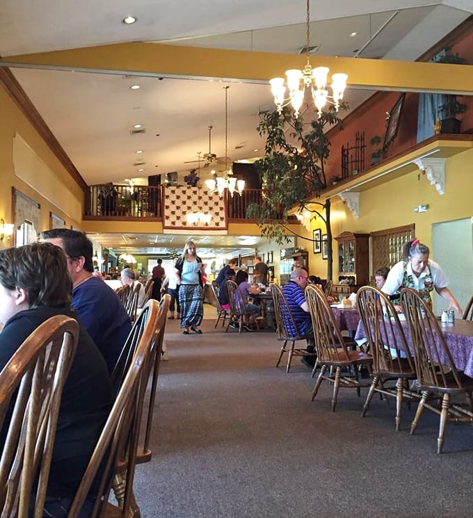 The bustling dining room hums with the symphony of satisfaction—servers gliding between tables, carrying plates that make everyone else wonder, "Should I have ordered that instead?" 