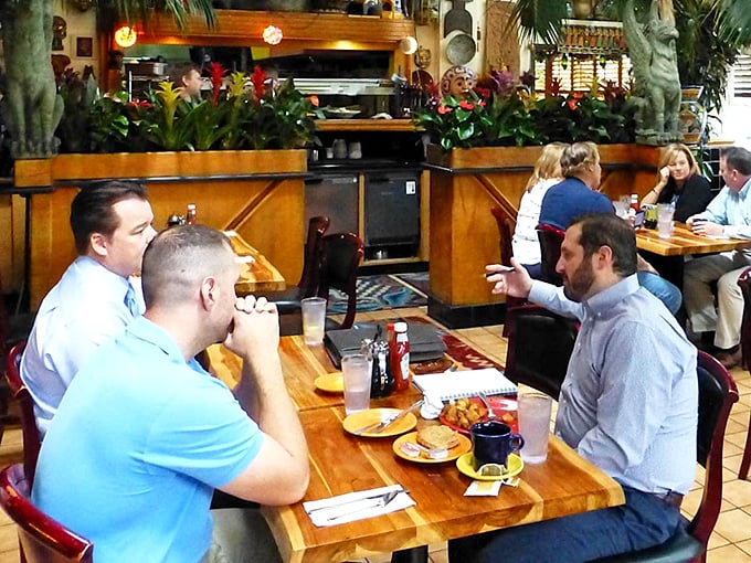 The dining room hums with conversation and clinking glasses—a community gathering place where Sacramento's diverse population breaks bread together.