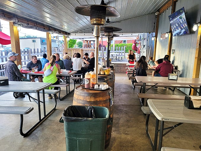 The corrugated ceiling and picnic tables create that perfect "fancy casual" vibe where everyone feels welcome.