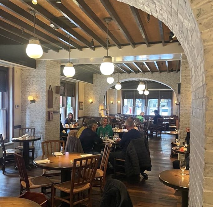 The dining room buzzes with conversation and clinking glasses – the universal soundtrack of people having a genuinely good time.